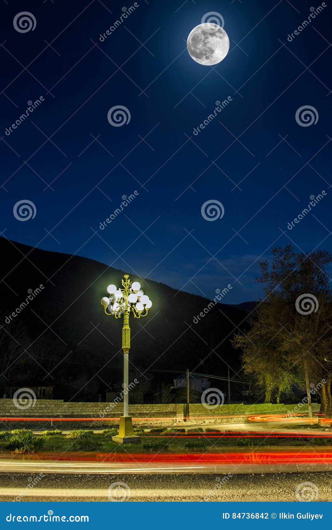 Full Moon Over an Empty Highway Crossing at Night. Stock Photo - Image ...