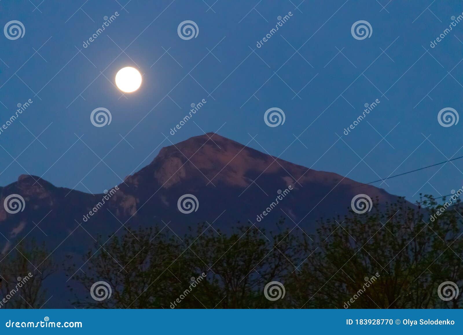 Full moon over mountain stock photo. Image of dramatic - 183928770