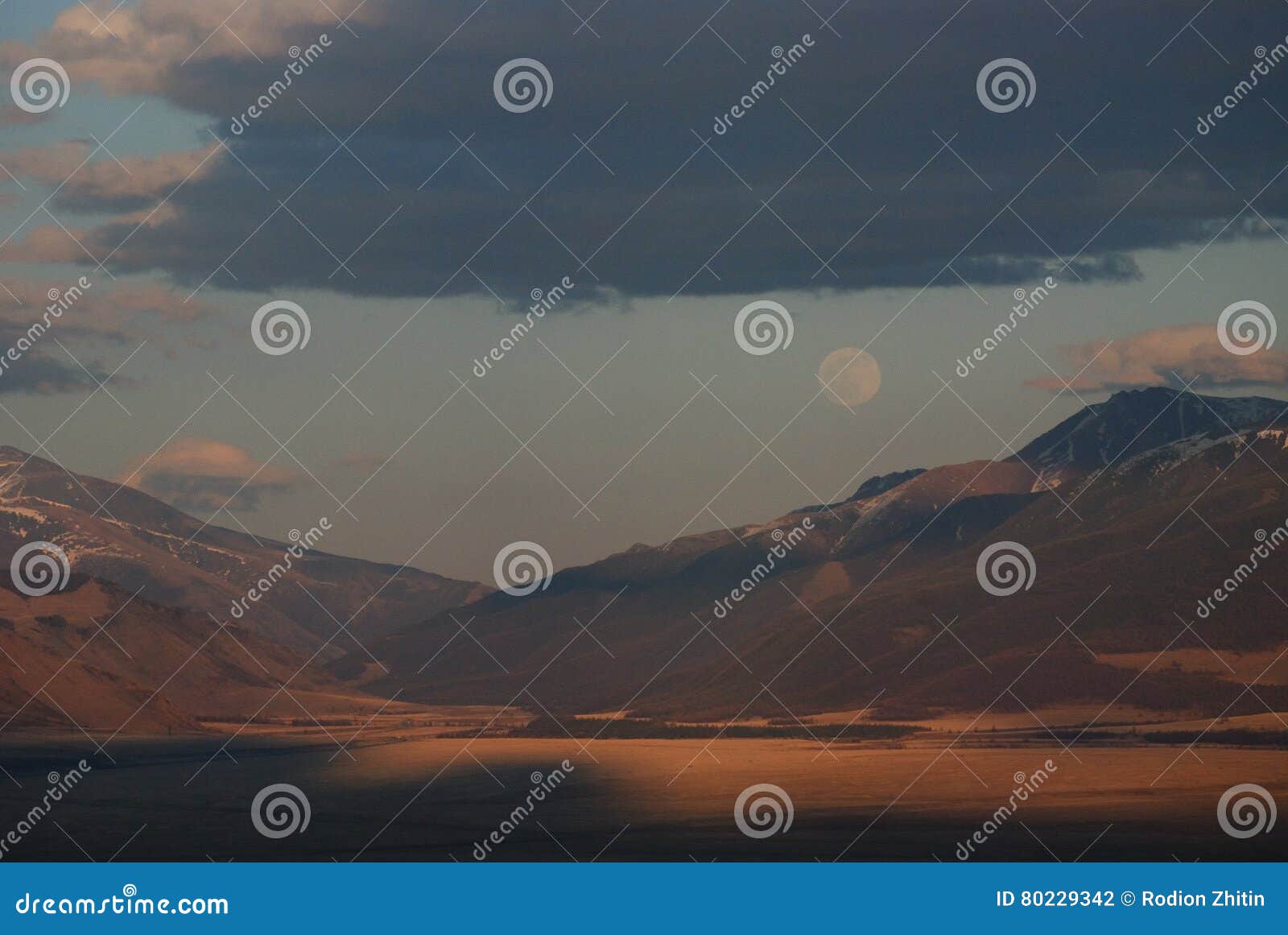Full Moon Over the Mountains and the Sunset Stock Photo - Image of ...