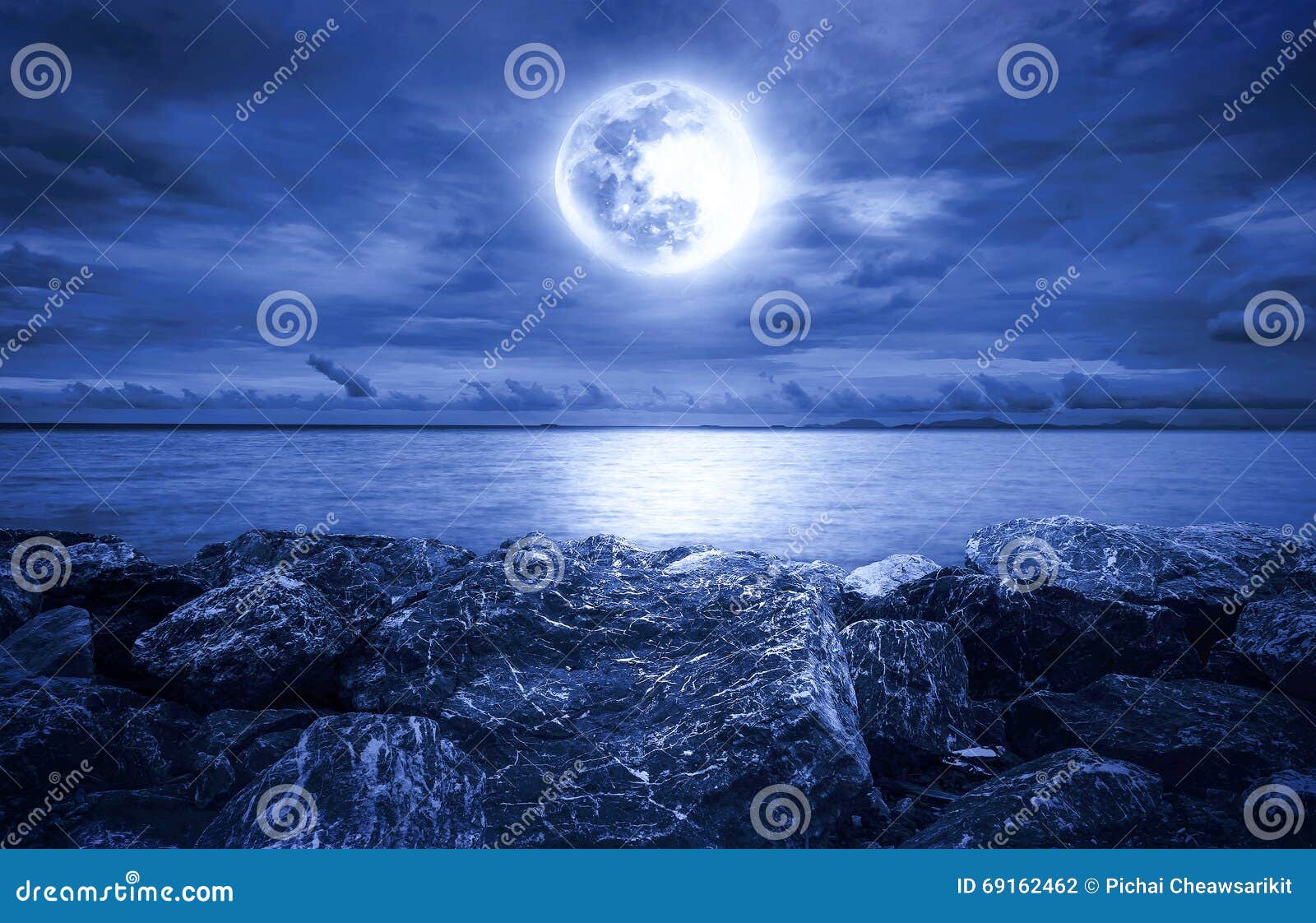 Full moon over the ocean stock photo. Image of night - 69162462