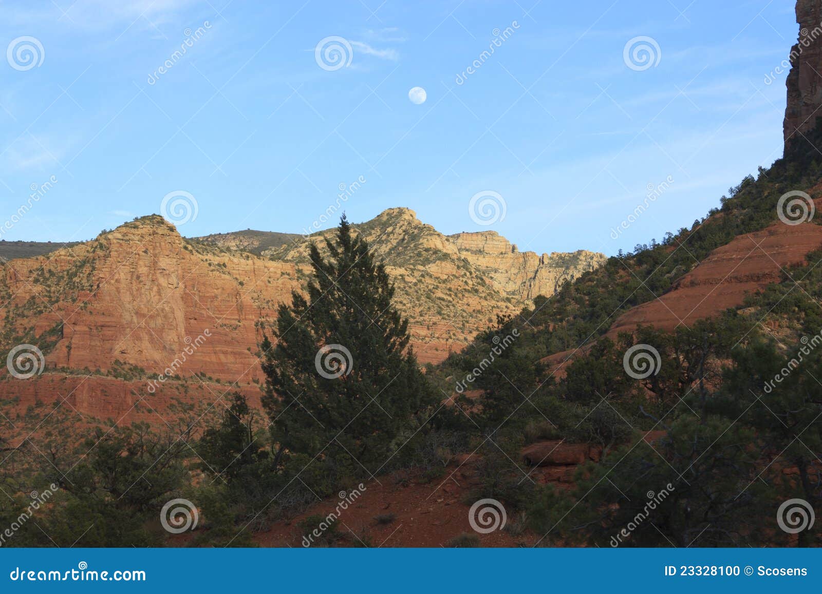 Full moon over red rocks stock photo. Image of moon, rising - 23328100