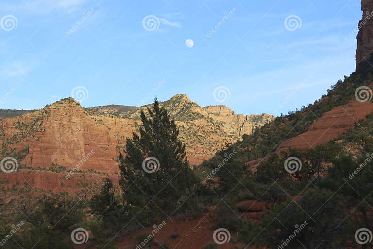 Full moon over red rocks stock photo. Image of moon, rising - 23328100