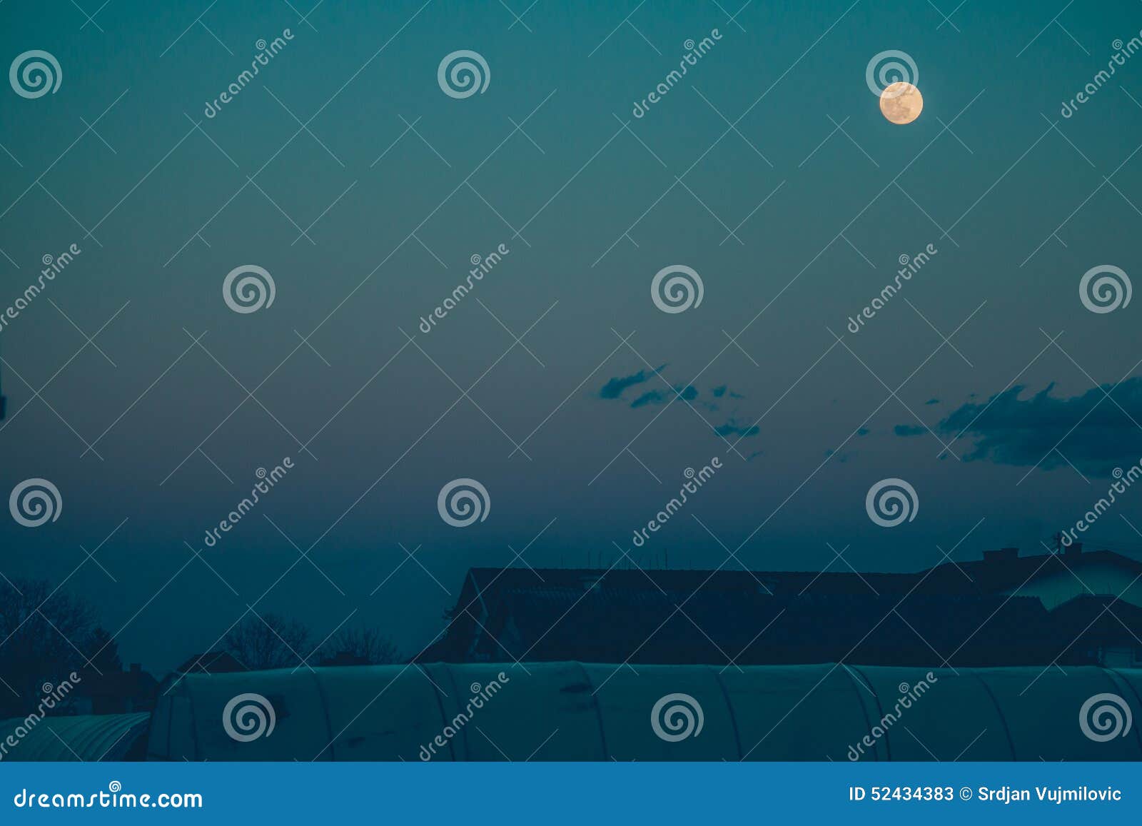 Full Moon over the Roofs stock image. Image of background - 52434383