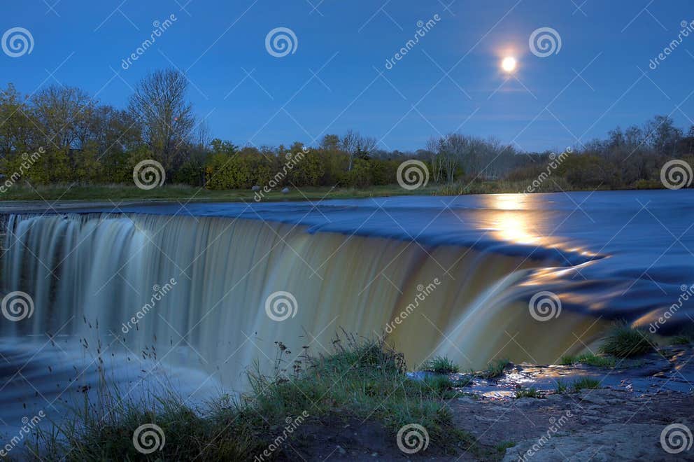 Full Moon Over Waterfall stock photo. Image of luminosity - 6790780