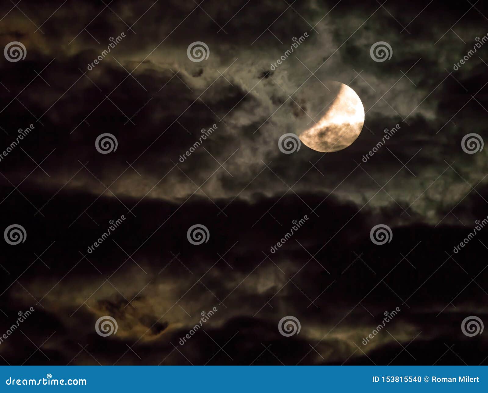 Full moon partial eclipse stock photo. Image of glow - 153815540