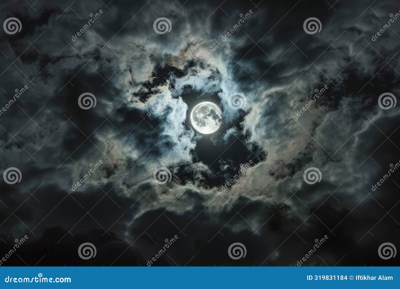 Full Moon Partially Visible through Dark Passing Clouds in the Night ...