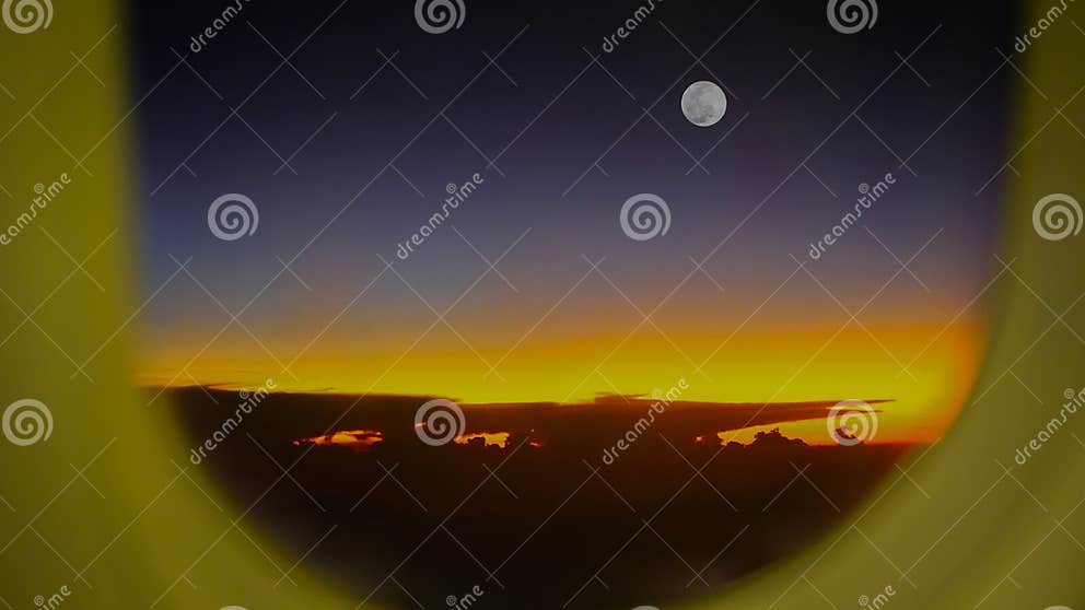 Full Moon and Sunset Flight View Stock Photo - Image of moon, cloud ...