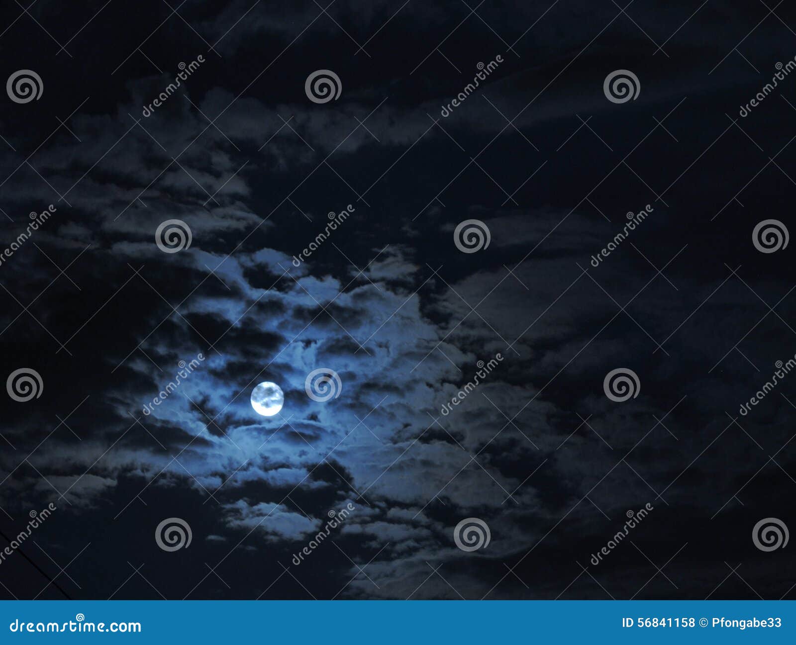 Full moon under clouds stock photo. Image of moonlight - 56841158