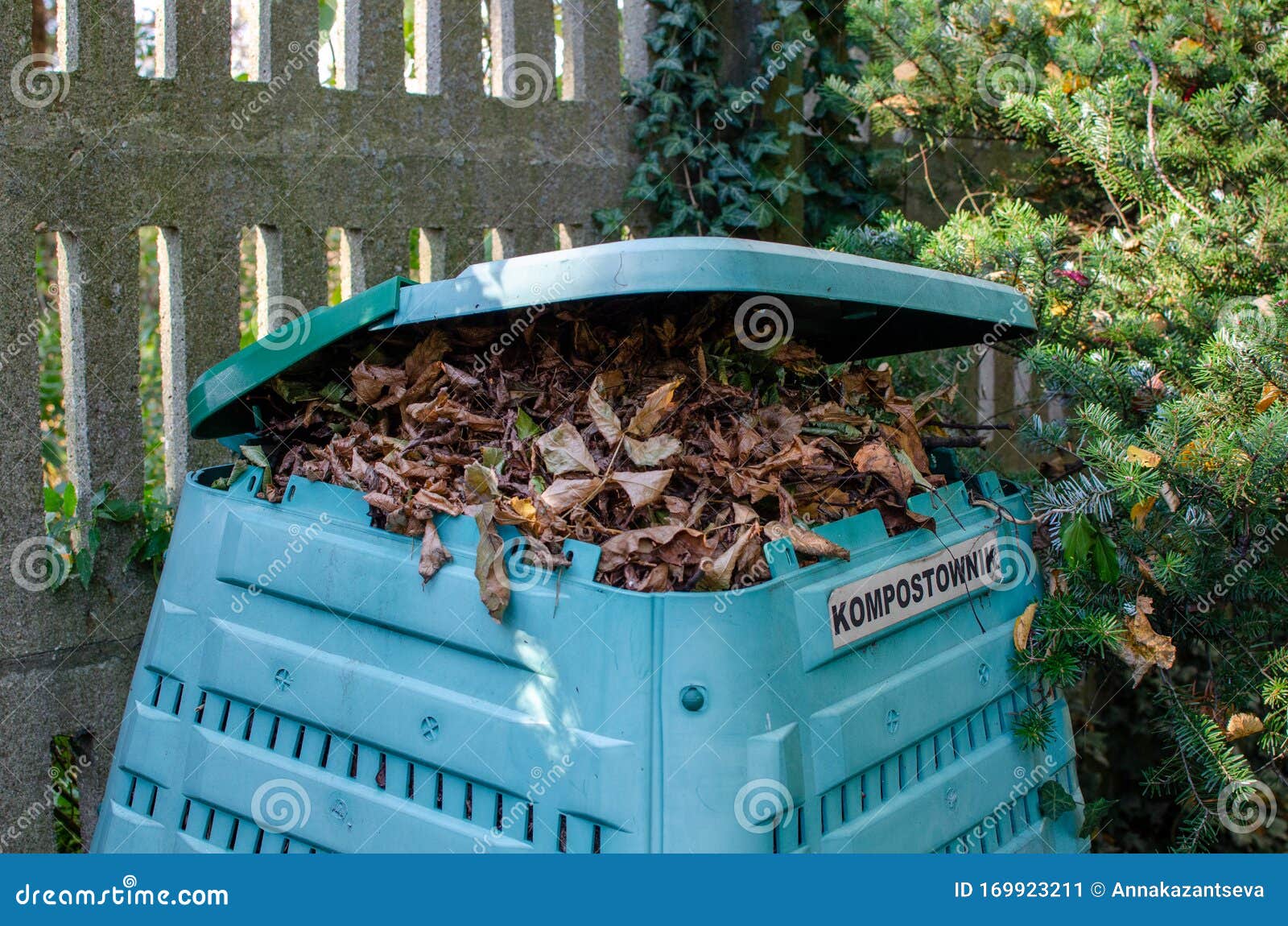 Full Outside Plastic Compost Container with Leaves and Branches. Text ...