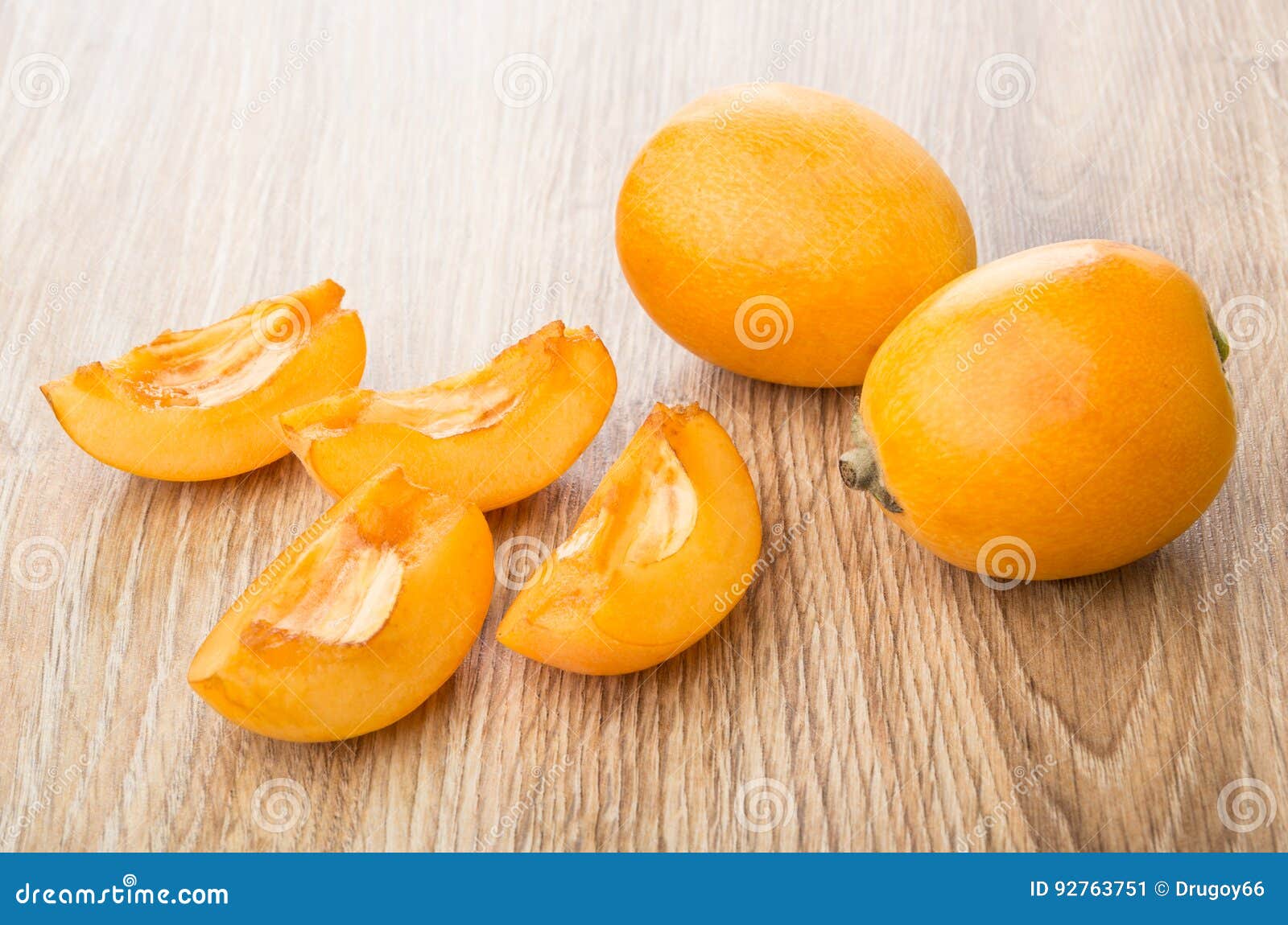 Full and Pieces of Ripe Loquat on Table Stock Image - Image of fruit ...