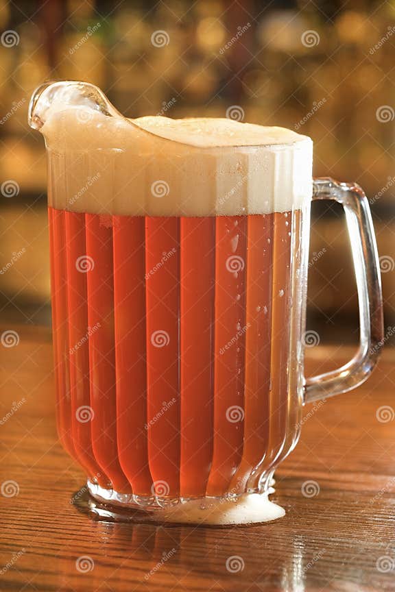 Full Pitcher of Beer stock photo. Image of drink, tavern - 12676280