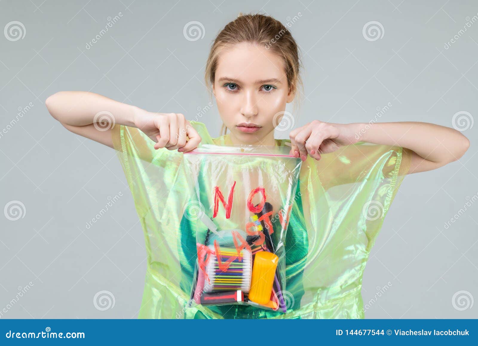 Angry Model Posing with Transparent Bag Full of Plastic Stock Photo ...
