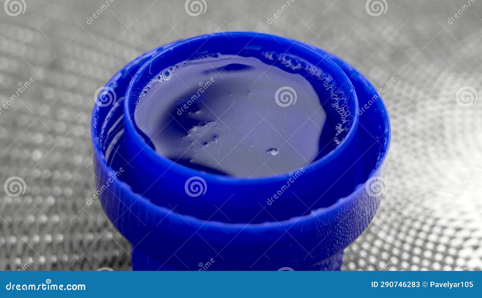 Full Plastic Cap with Blue Laundry Liquid Detergent Close Up. Stock ...