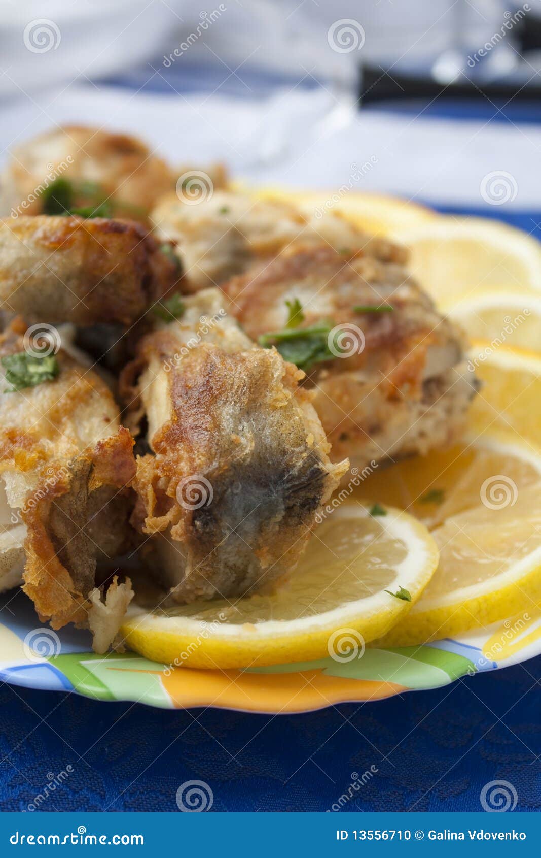 Full Plate of the Fried Pieces of a Fish Stock Photo - Image of front ...