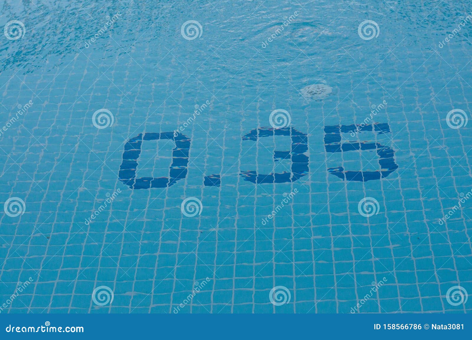 A Full Pool with a Depth Symbol on the Tile Below the Surface of the ...
