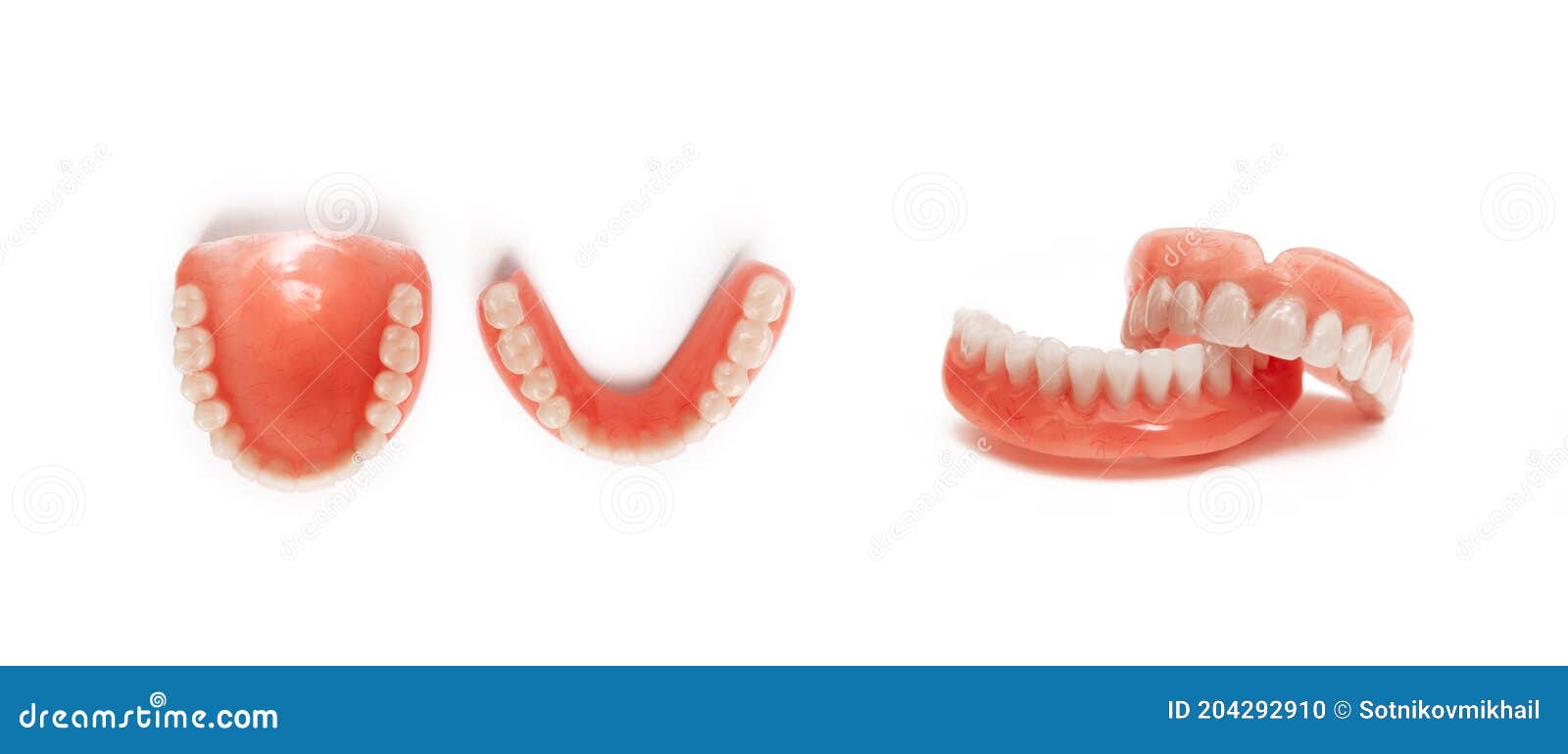Full Removable Plastic Denture Of The Jaws. Set Of Dentures On A White ...