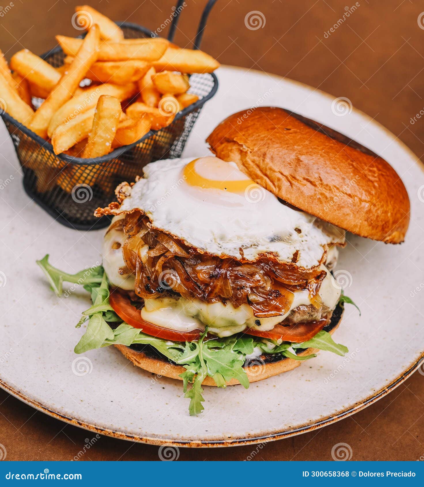 Full Rustic Beef Burger with Fries and Fried Egg Stock Photo - Image of ...