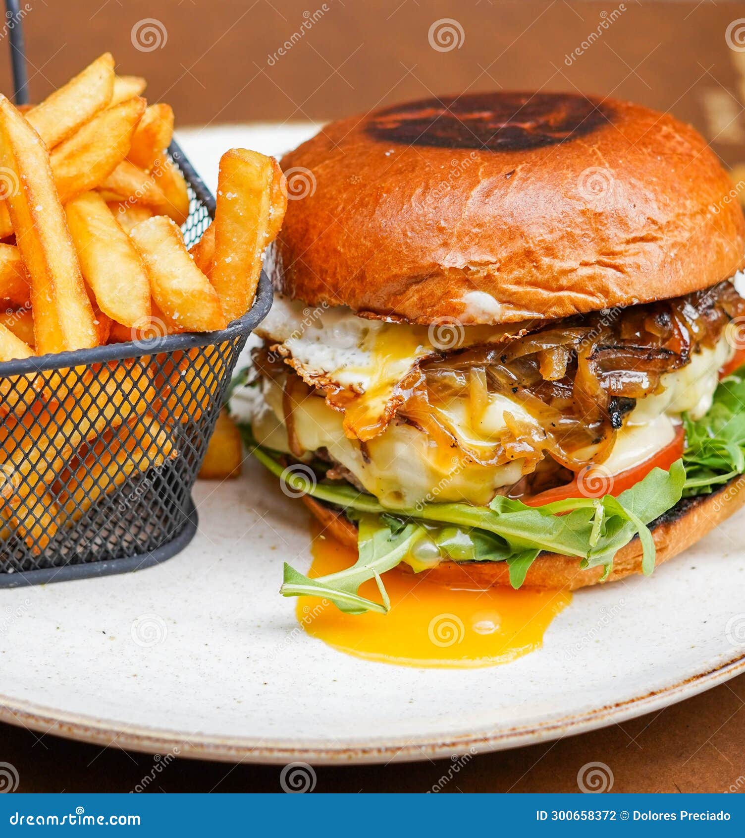 Full Rustic Beef Burger with Fries and Fried Egg Stock Photo - Image of ...