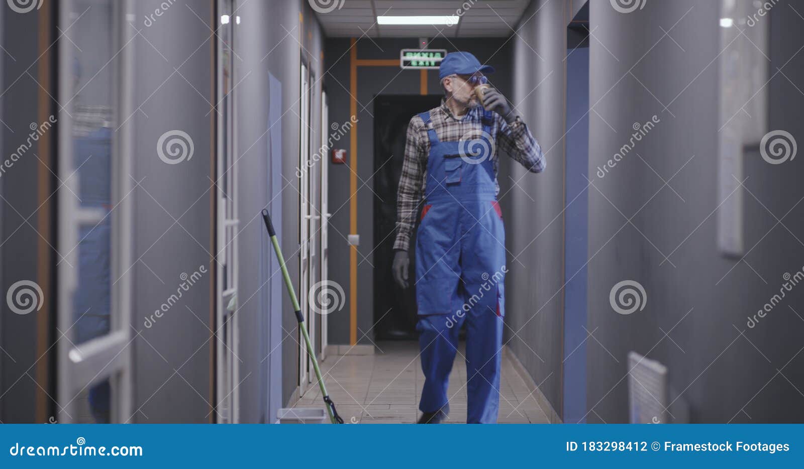 Janitor Checking Rooms in Building Stock Photo - Image of walking ...