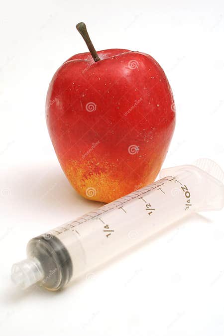 Full Shot Syringe with Apple Vertical Stock Image - Image of medical ...