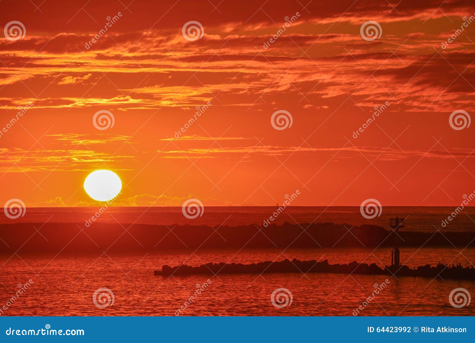 Full sun sunset over water stock photo. Image of full - 64423992