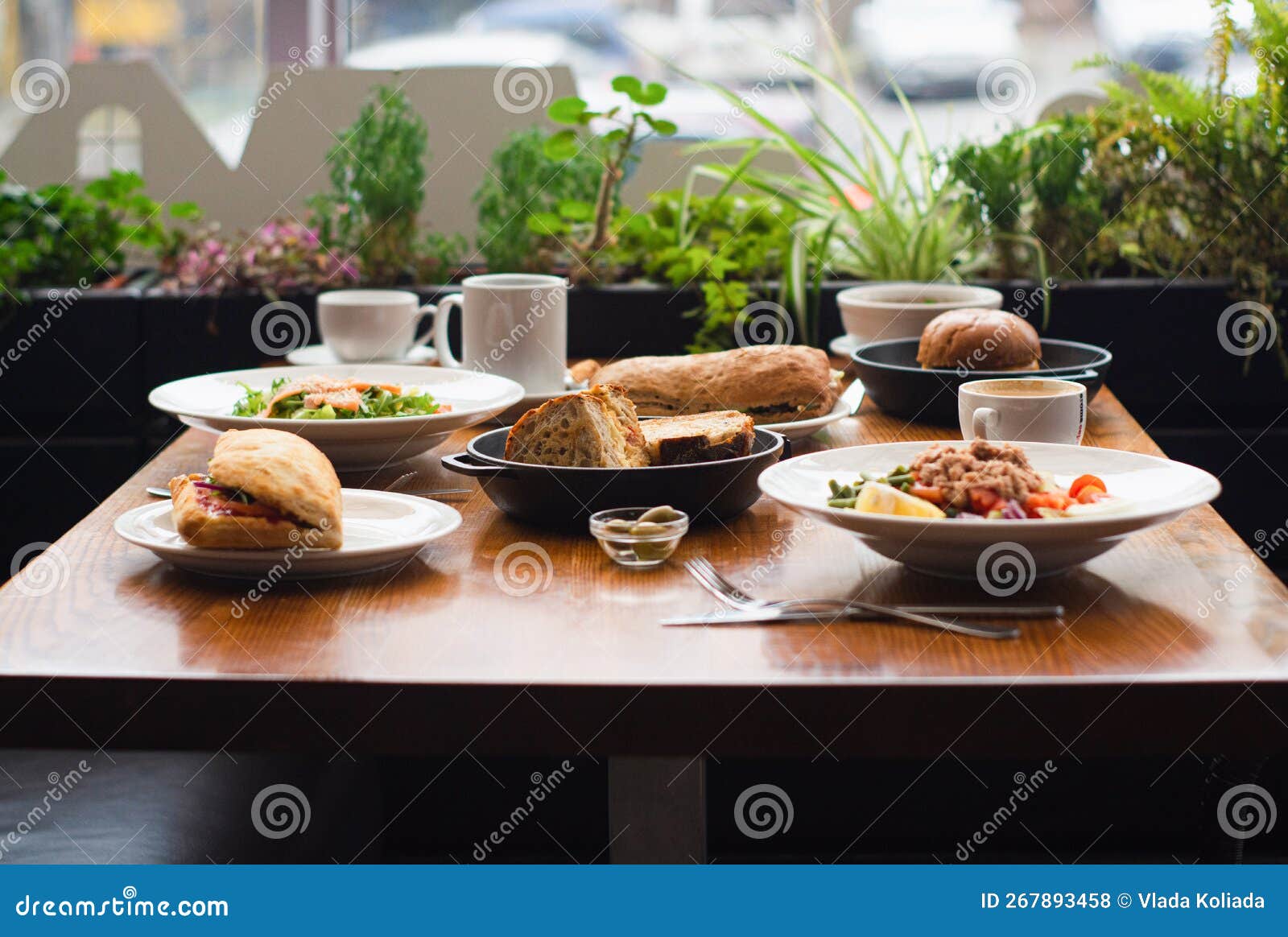 Full Table of Delicious and Different Dishes in Cafe with Cup of Coffee ...