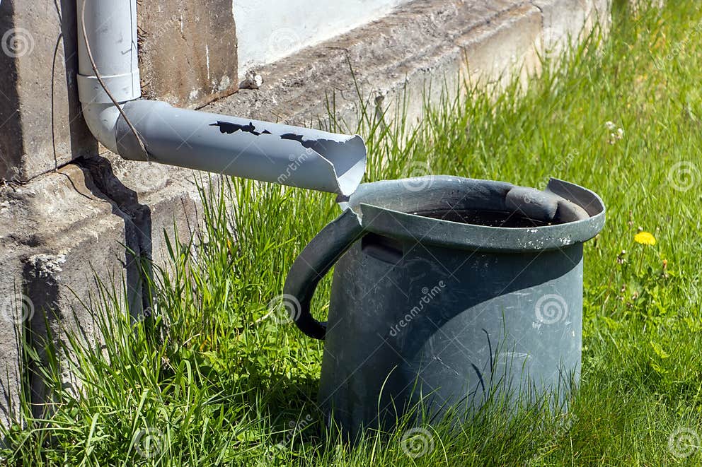 A Full Tank of Rainwater Under the Gutter Stock Image - Image of ...