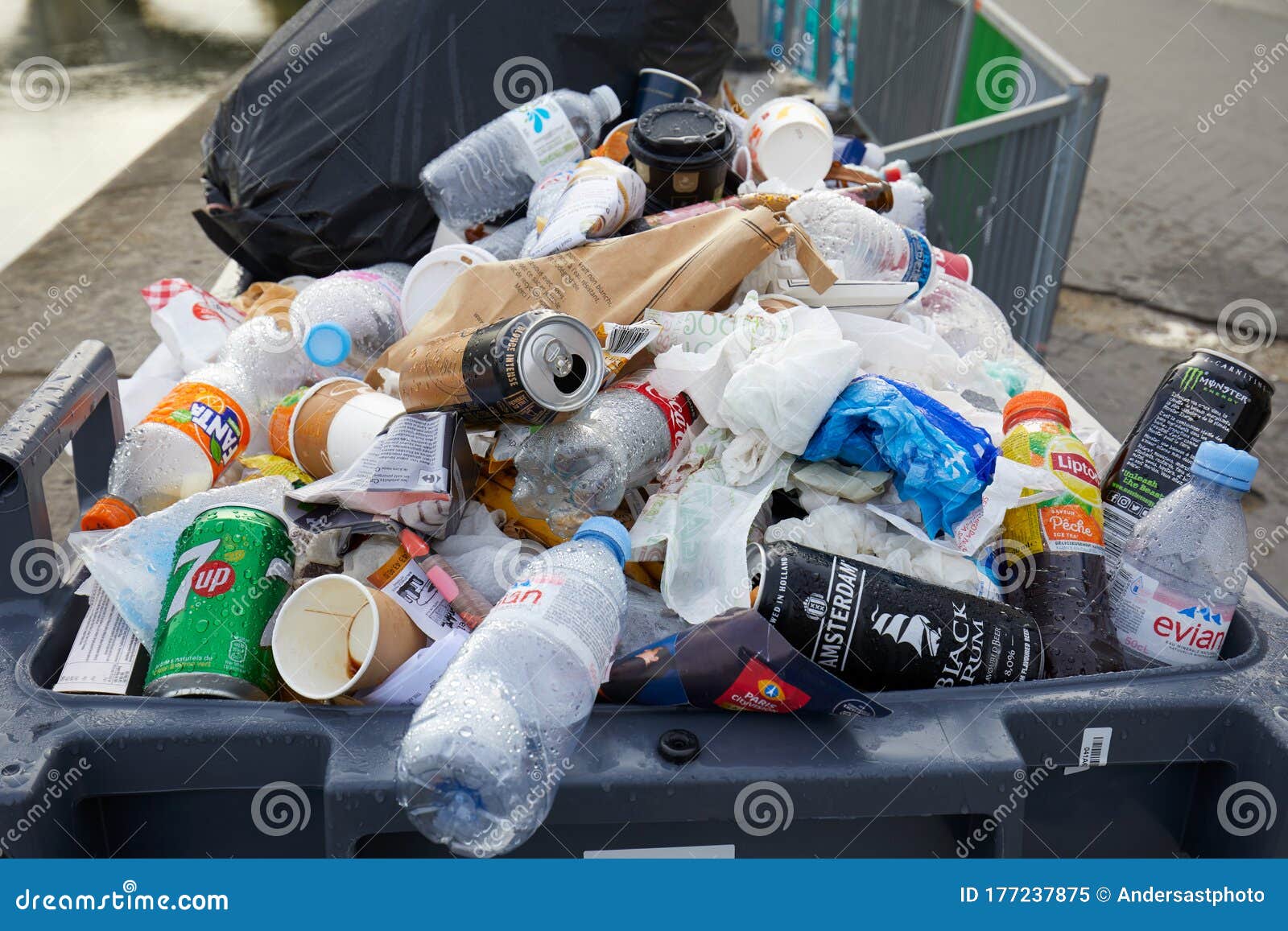 Full Trash Can. Trash Can Filled With Trash. Trash Can Packed To ...