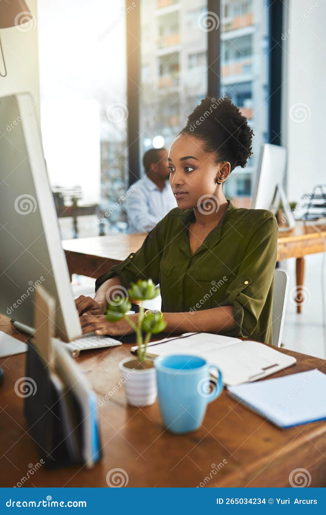 Fully Focused on the Task in Front of Her. a Businesswoman Working on ...