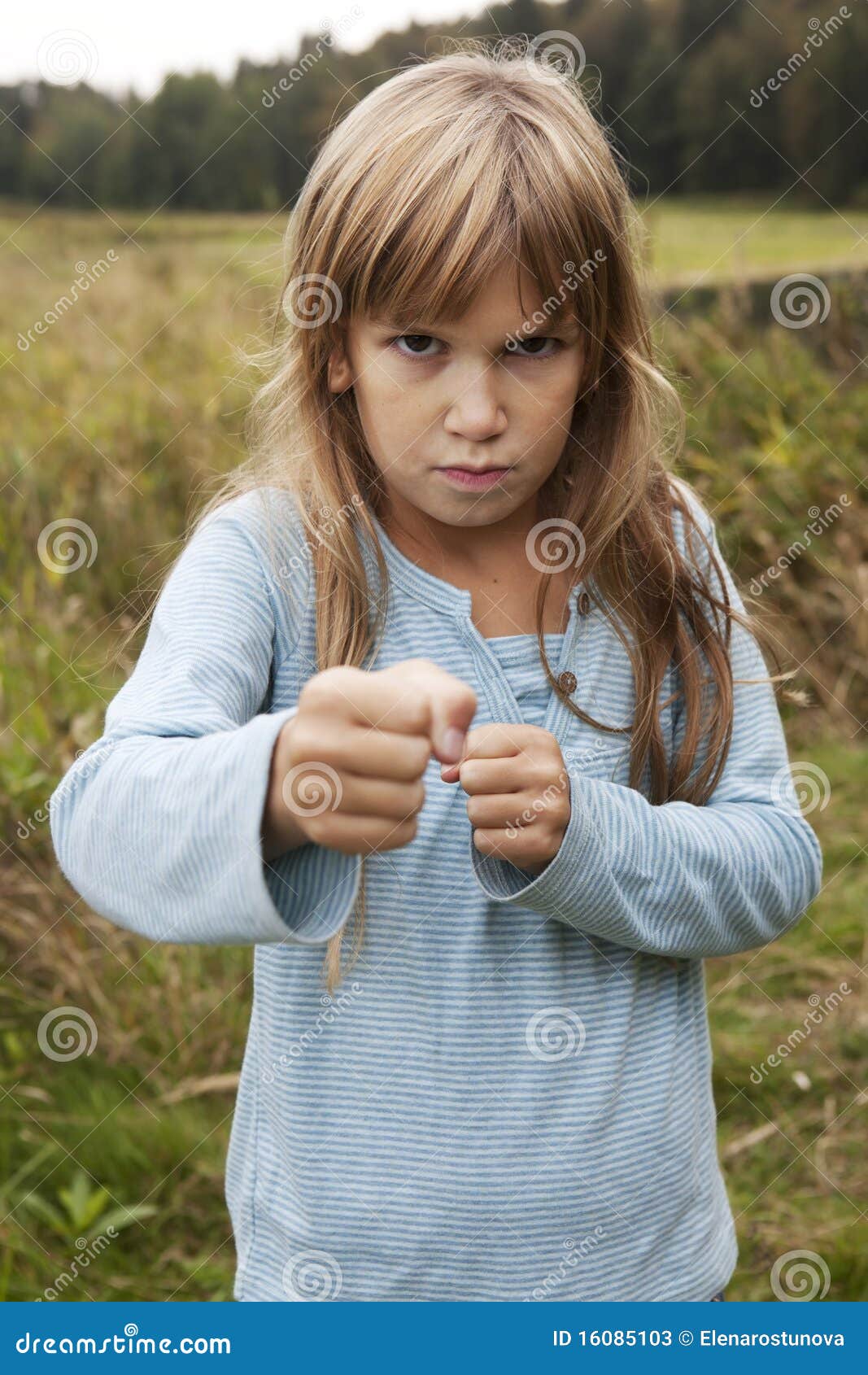 Fun angry little girl. stock image. Image of people, autumn - 16085103