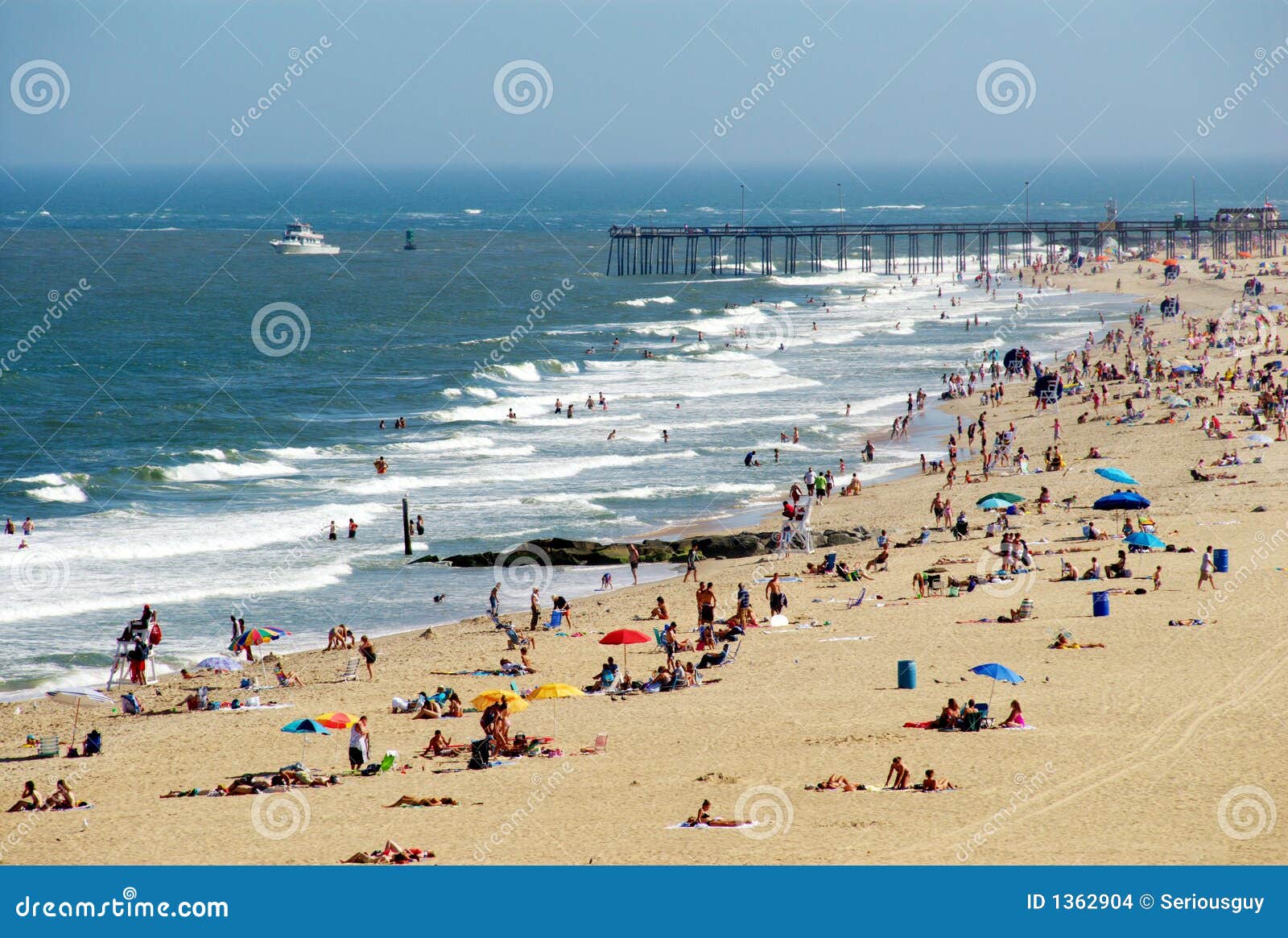 Fun at the Beach stock photo. Image of pier, boat, holiday - 1362904