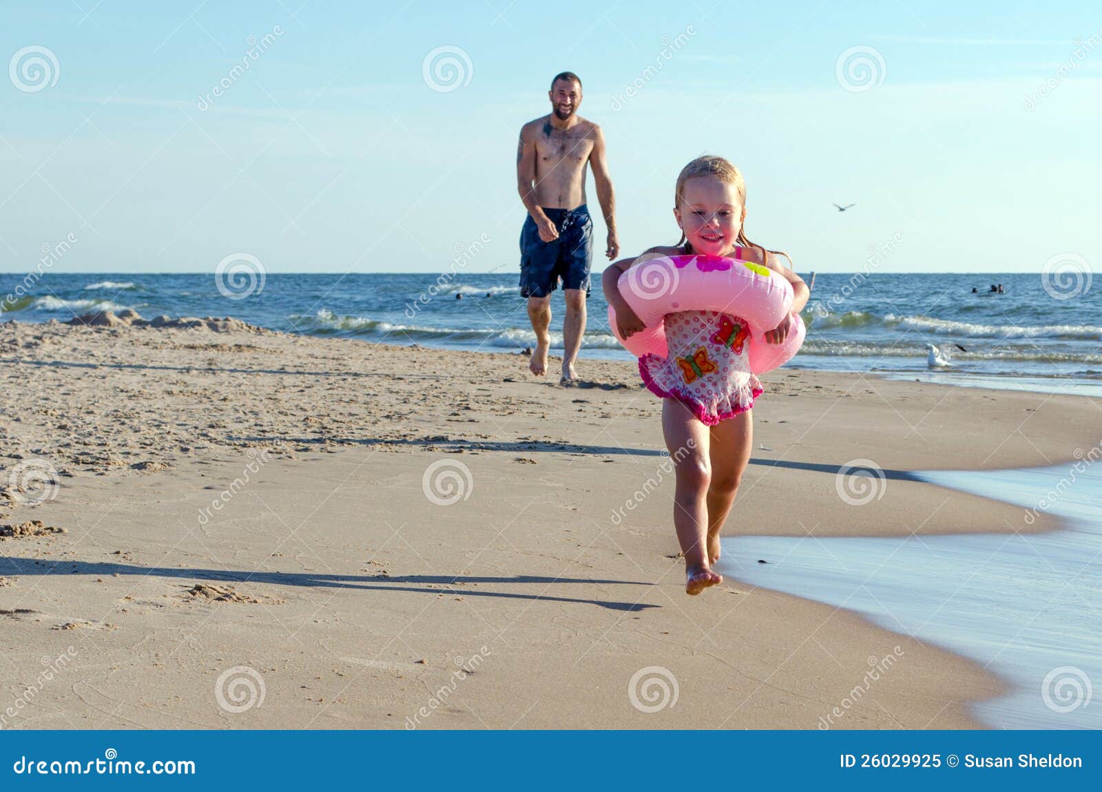Fun on the beach stock image. Image of active, parent - 26029925