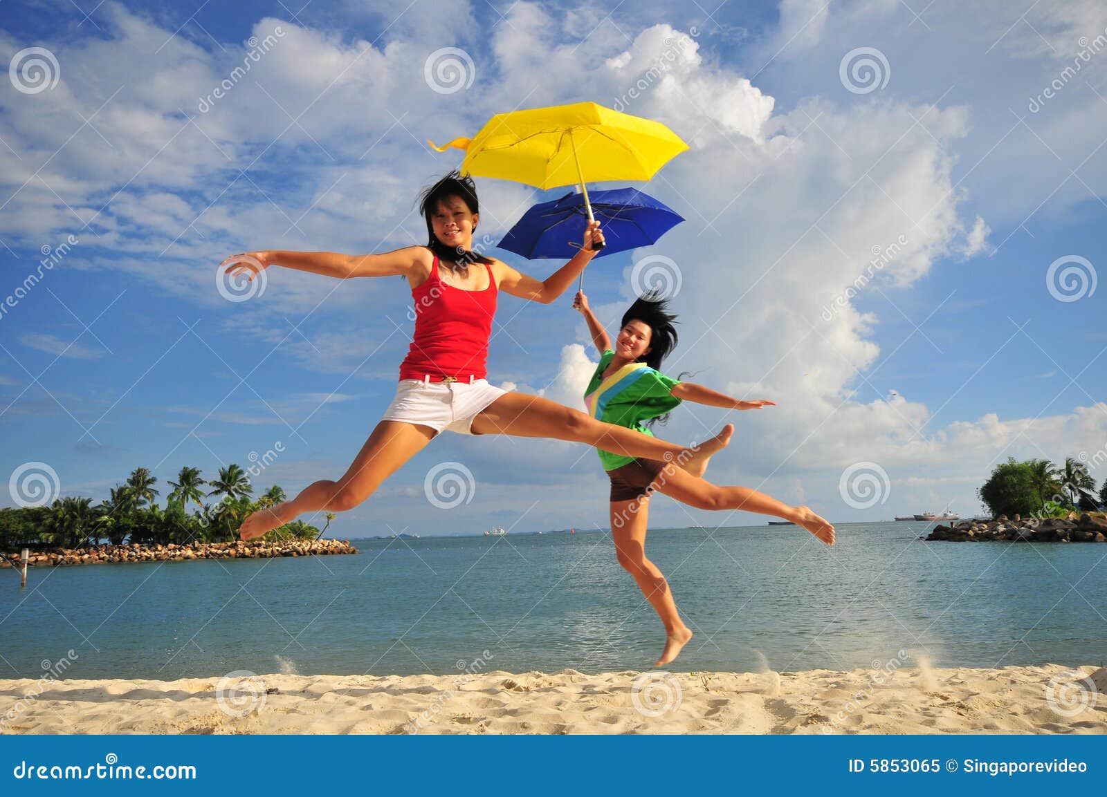 Fun at the Beach 35 stock image. Image of asia, blue, jump - 5853065