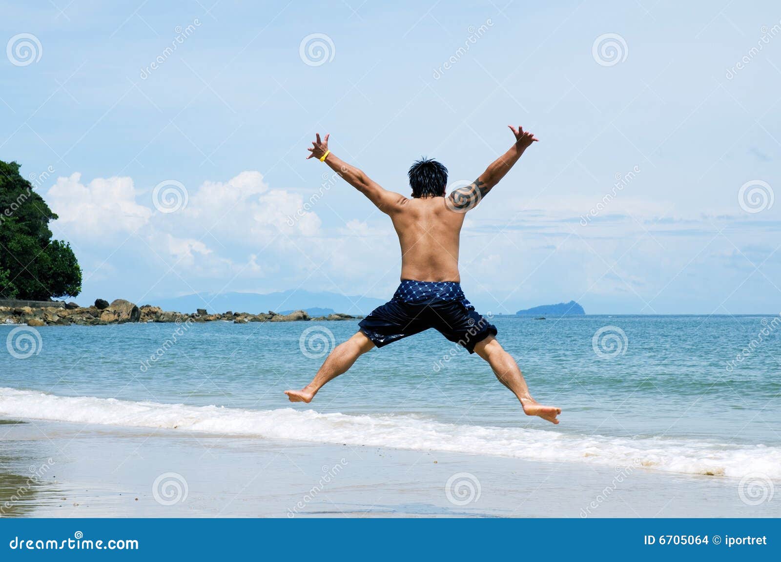 Man jumping on the beach stock photo. Image of male, asian - 6705064