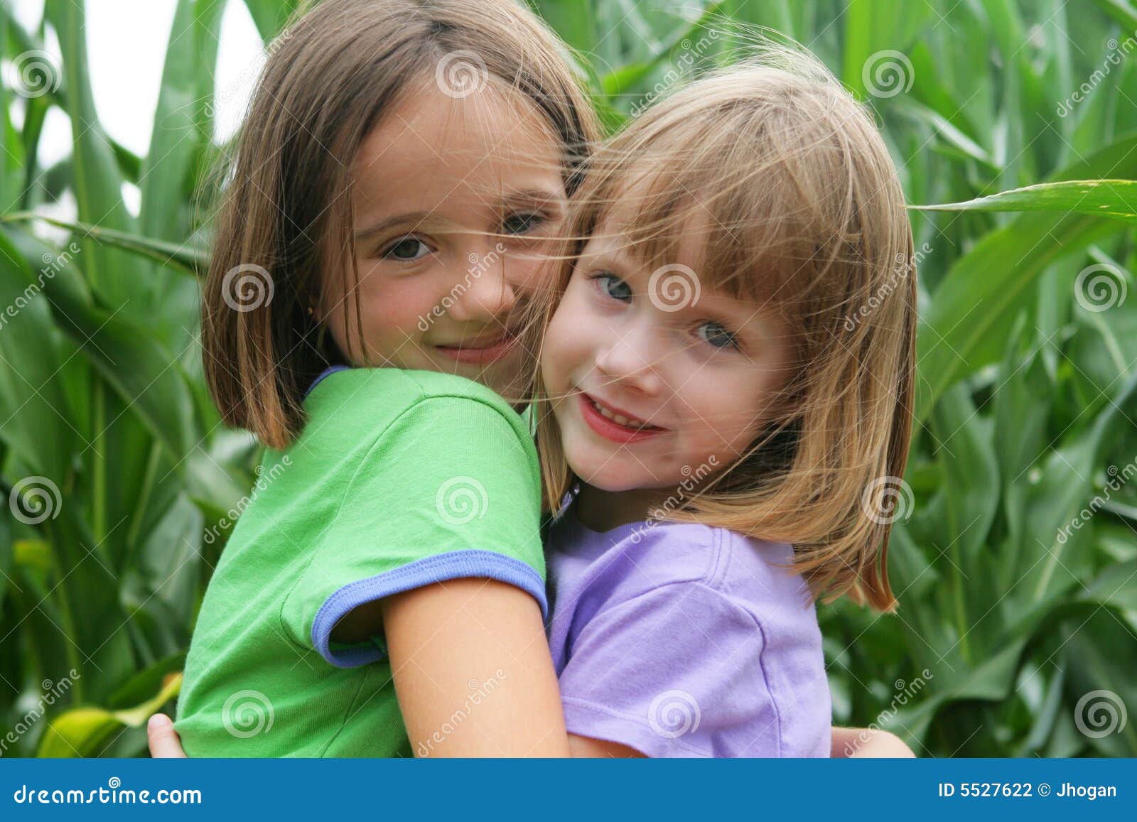 Fun in the corn field stock photo. Image of female, together - 5527622