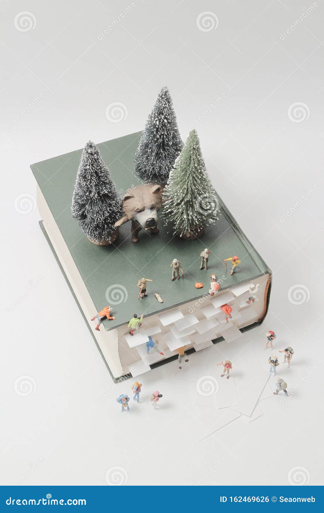 The Fun of Figure are Climbing on a Mountain of Textbooks Stock Photo ...