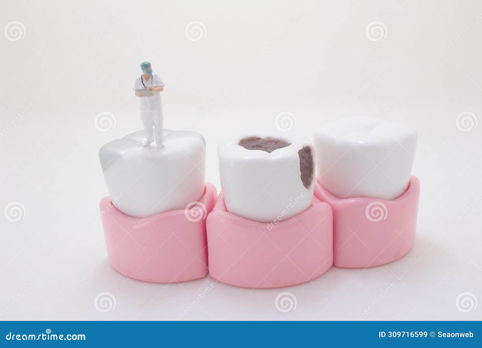 The Fun of Figure Dentist Repairing Human Teeth with Gums a Stock Image ...