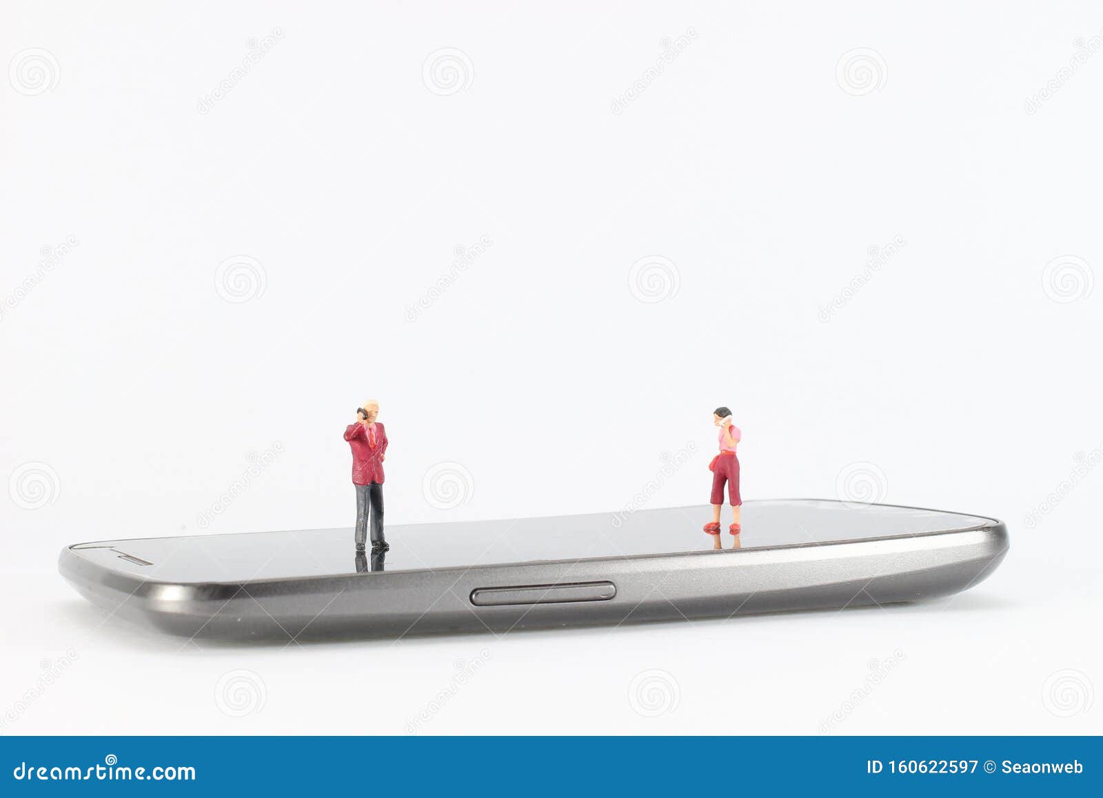 A Fun of Figure Talking a Mobile Phone Stock Image - Image of ...