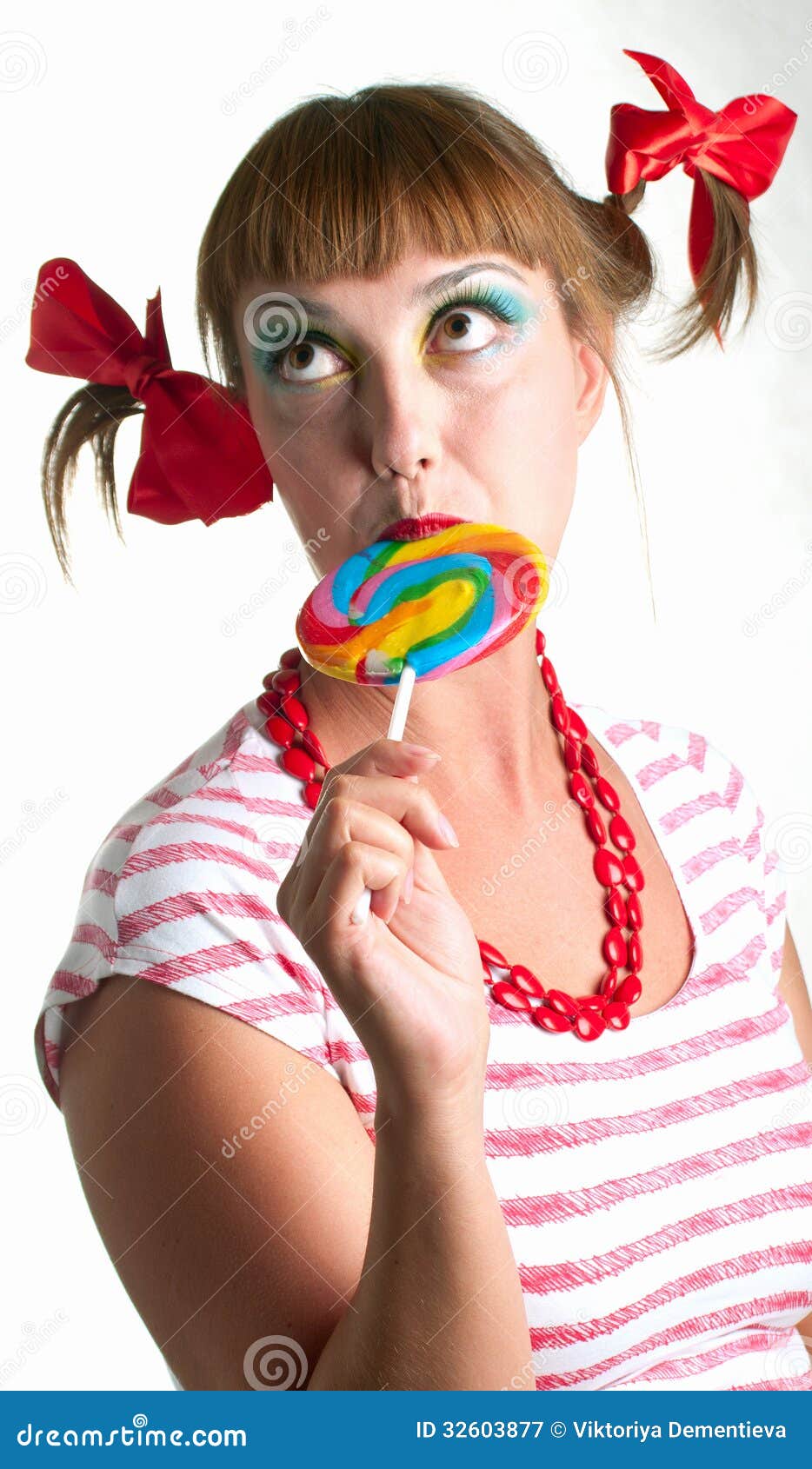 Fun girl with candy stock image. Image of bite, junk - 32603877