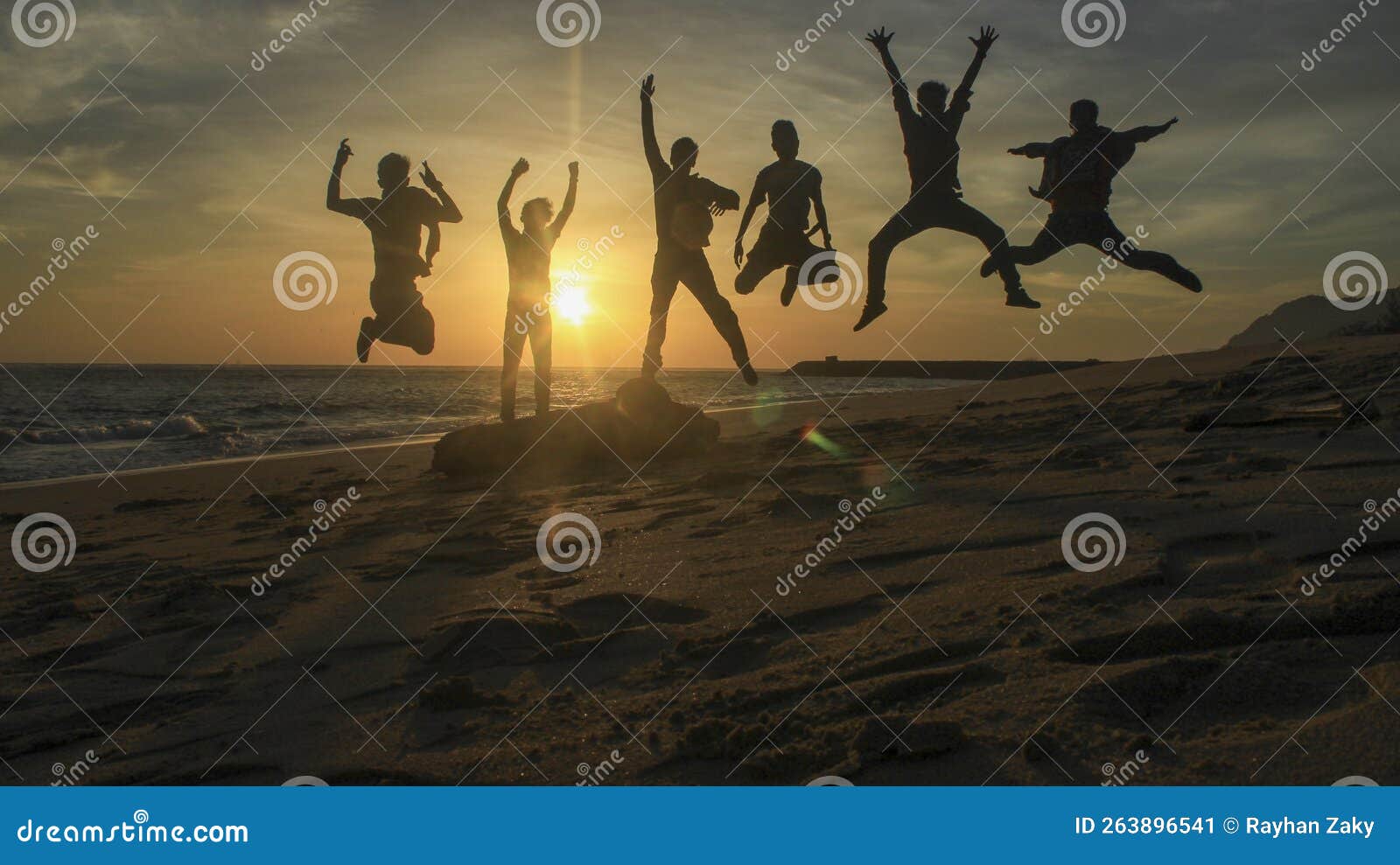 People Silhouette Jumping on the Sunset Beach Stock Image - Image of ...
