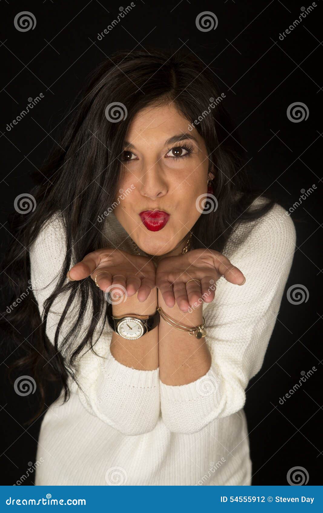 Fun Kissing Expression on a Dark Complected Beautiful Female Mod Stock ...