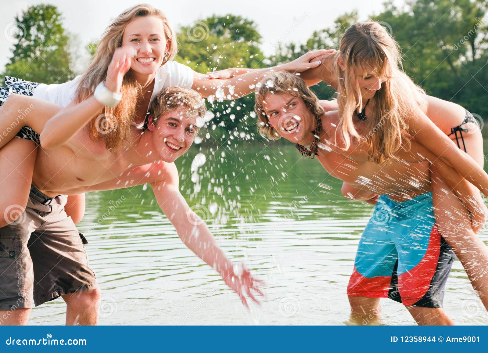 Fun at the lake stock photo. Image of freedom, couples - 12358944