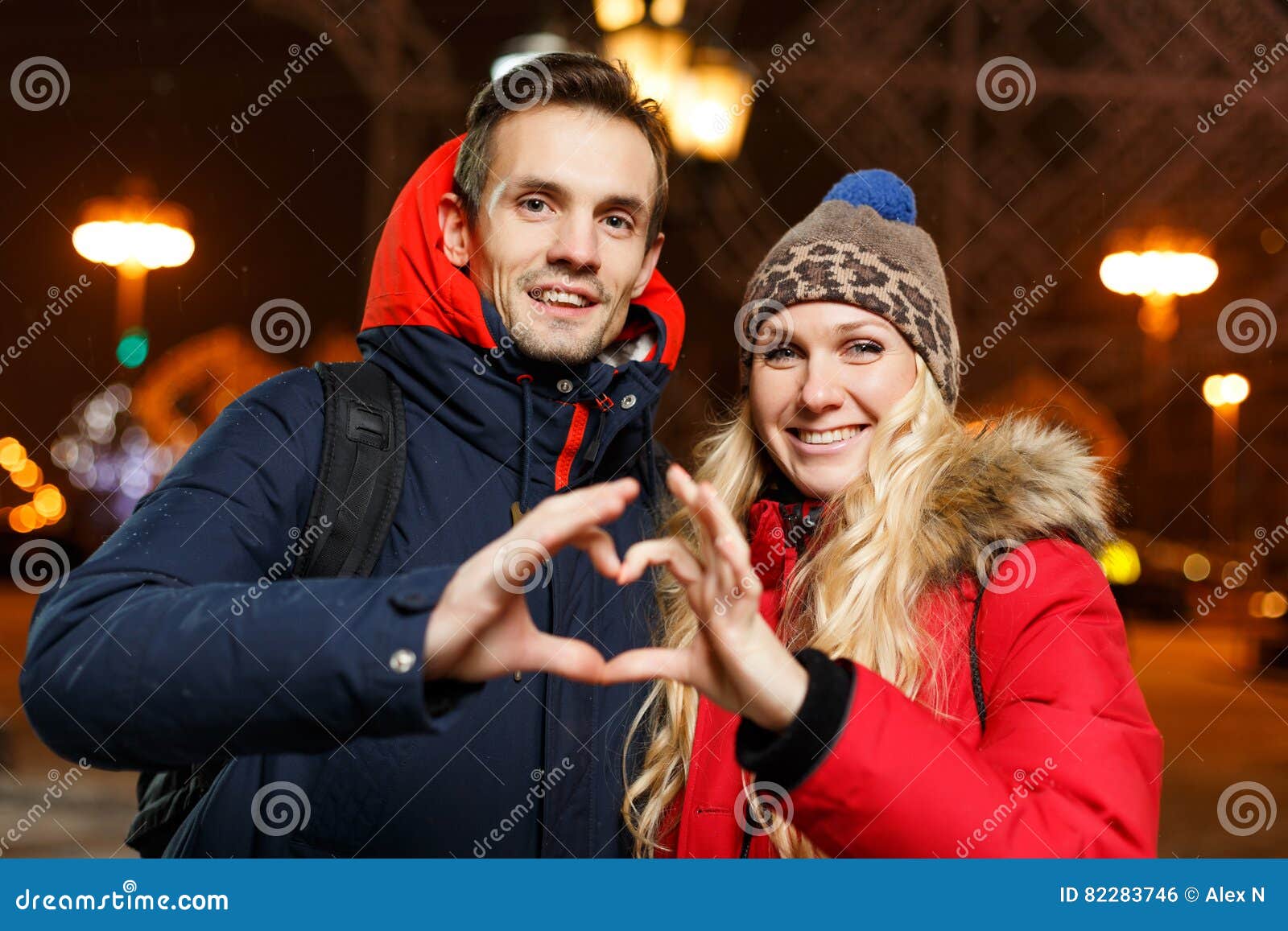 Fun lovers in new year stock photo. Image of coat, city - 82283746