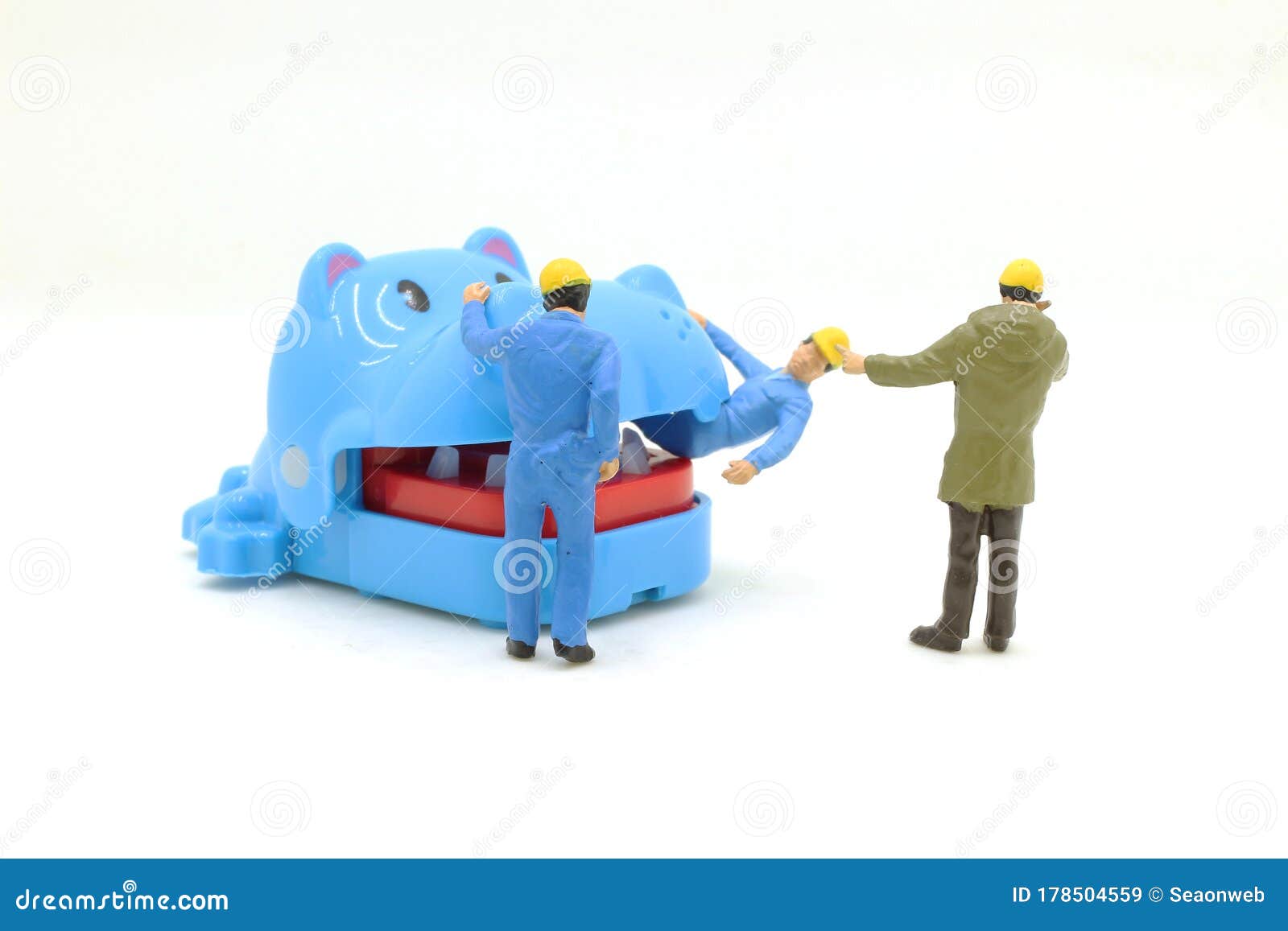 A Fun of Mini Figure Checking the Toy Mechanical Stock Image - Image of ...