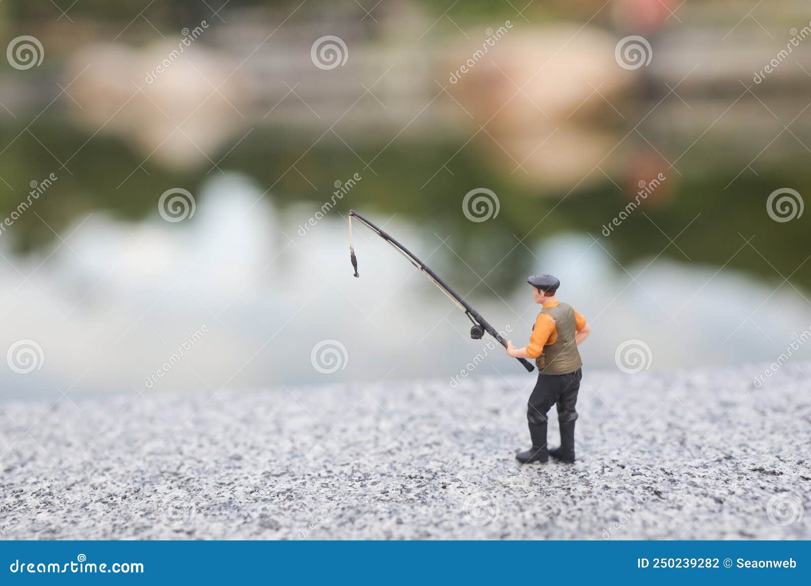 A Fun of Mini Figure is Fishing Stock Photo - Image of outdoor, idea ...