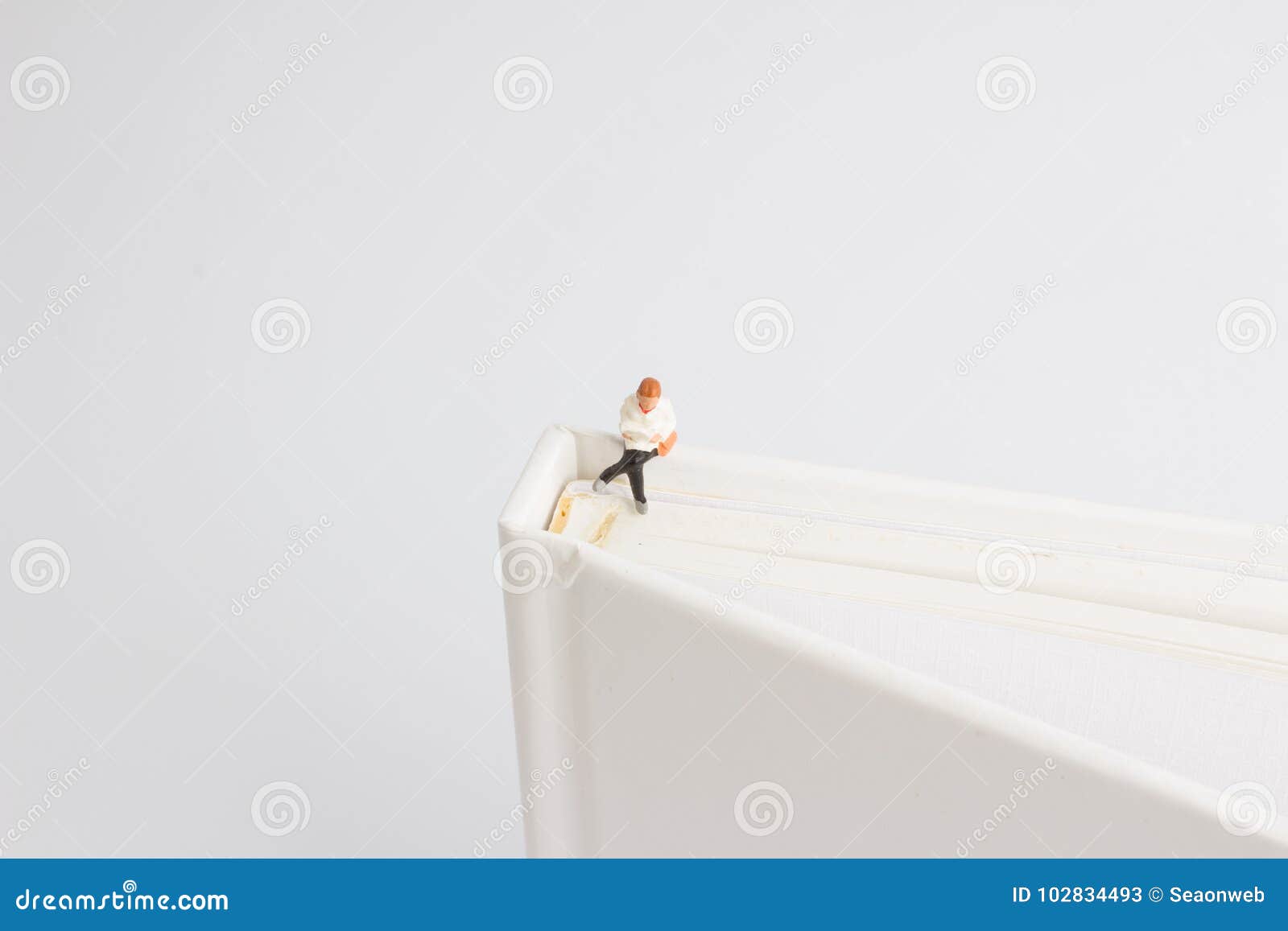 The Fun of Mini Figure Reading on Book Stock Image - Image of ...