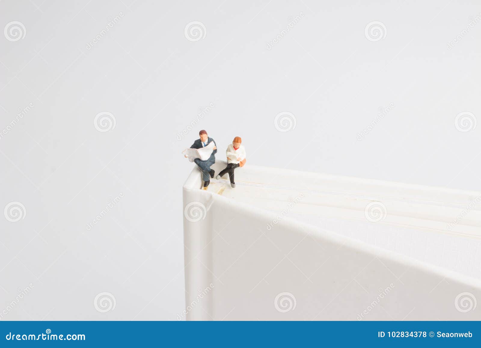The Fun of Mini Figure Reading on Book Stock Photo - Image of ...
