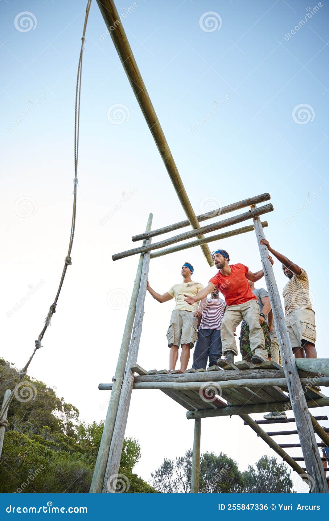 This is the Fun Part. a Group of Men Going through an Obstacle Course ...