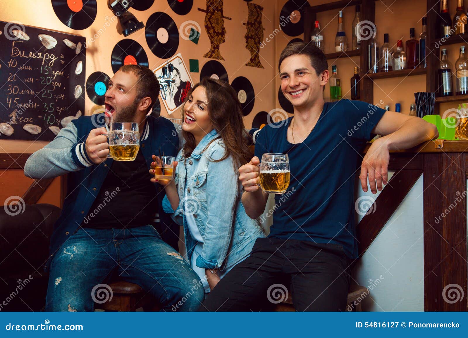 Fun People at Bar Looking Away Drinking and Laughs Stock Image - Image ...
