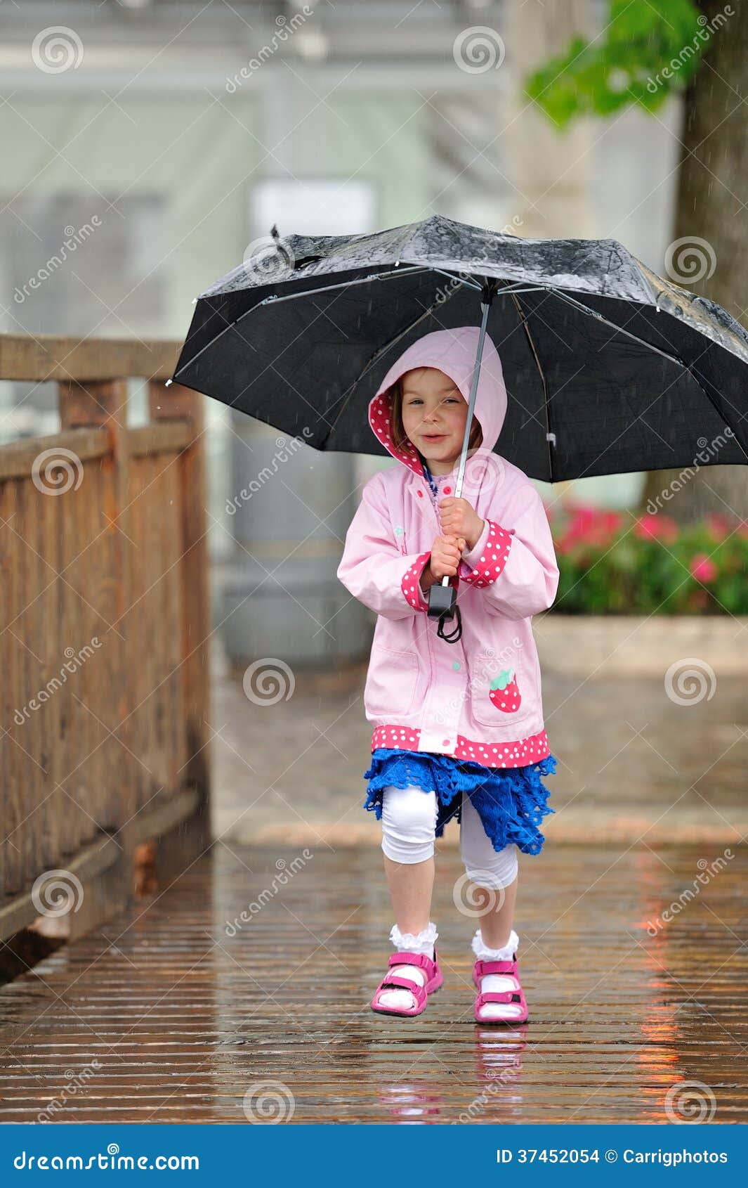 Fun in the Rain stock photo. Image of sandals, pink, blue - 37452054